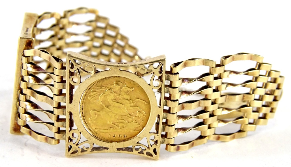 A half gold sovereign gate bracelet, the Edward VII half gold sovereign ...