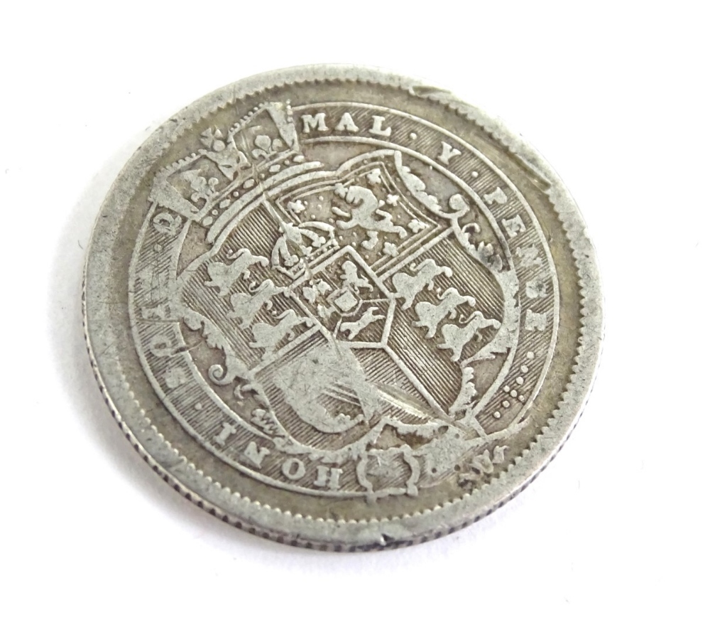 A George III bullhead shilling 1816.