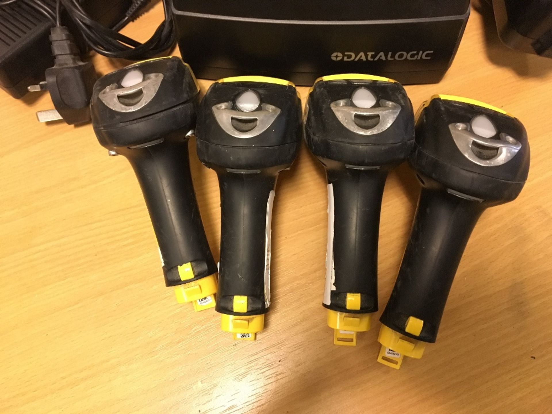 Set of Datalogic Product scanners and charging stations comprising of ...