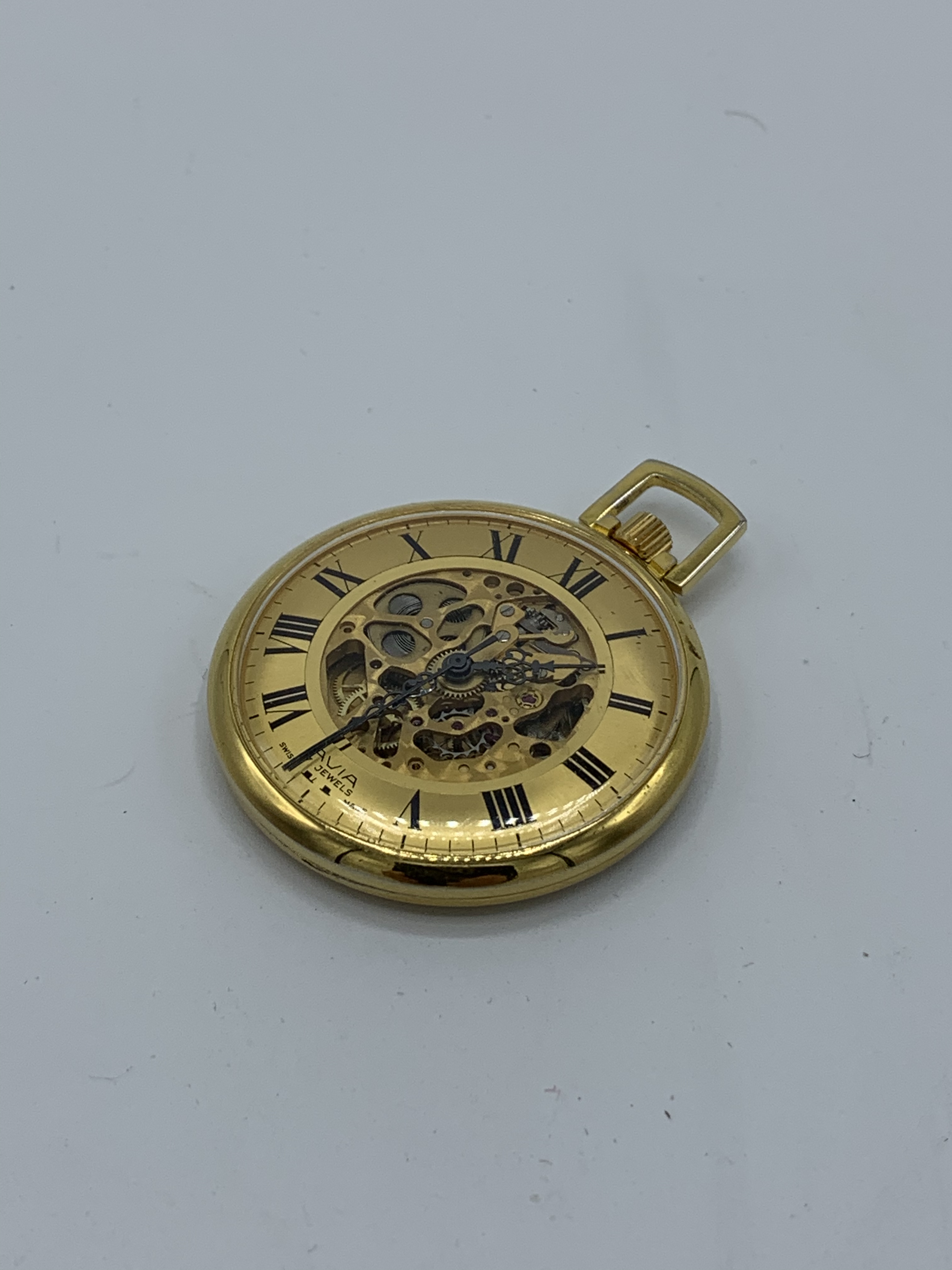 AVIA 17 jewels open face pocket watch in yellow metal case. Going order ...