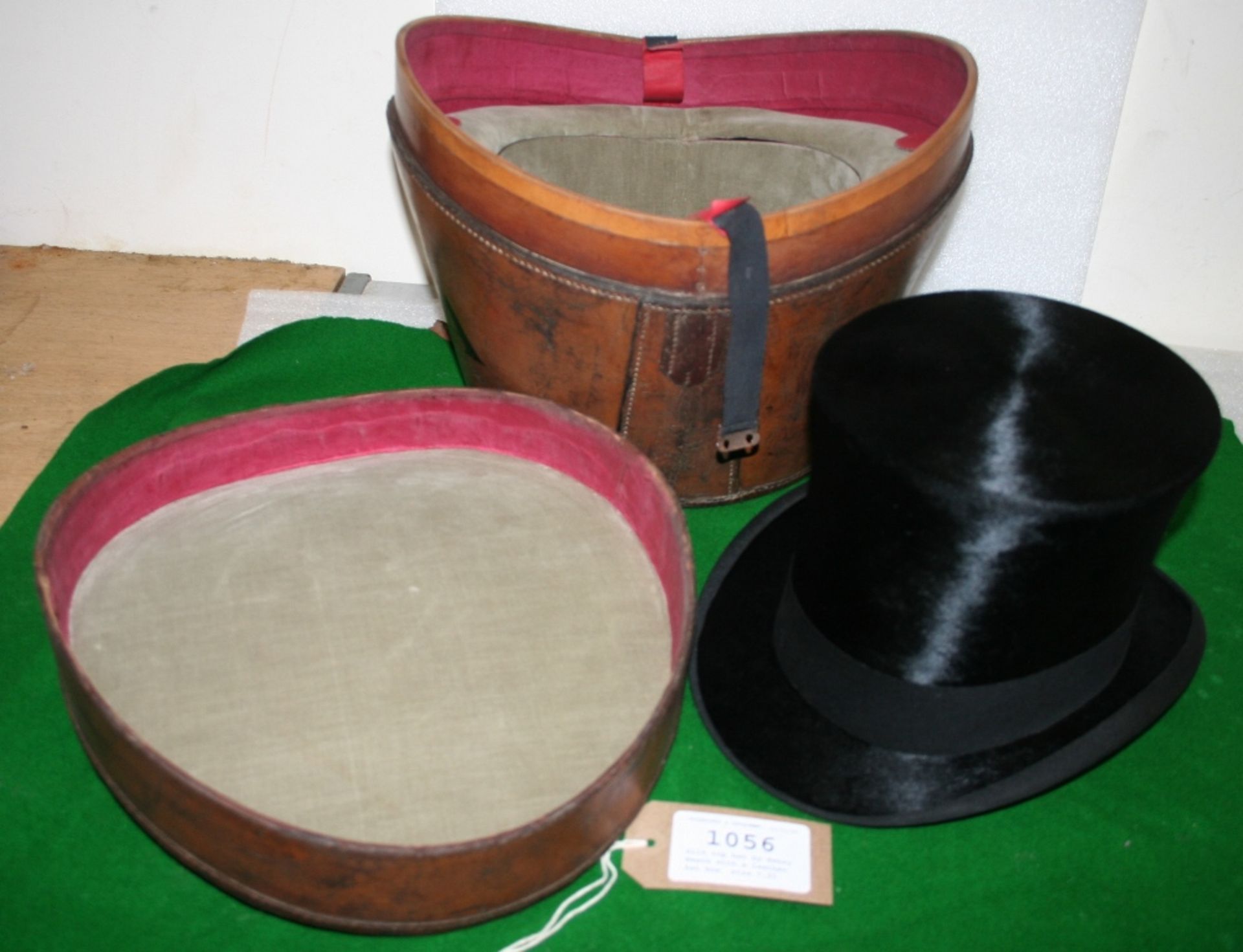 Silk top hat by Henry Heath size 7 1/4, with a leather hat box Estimate ...