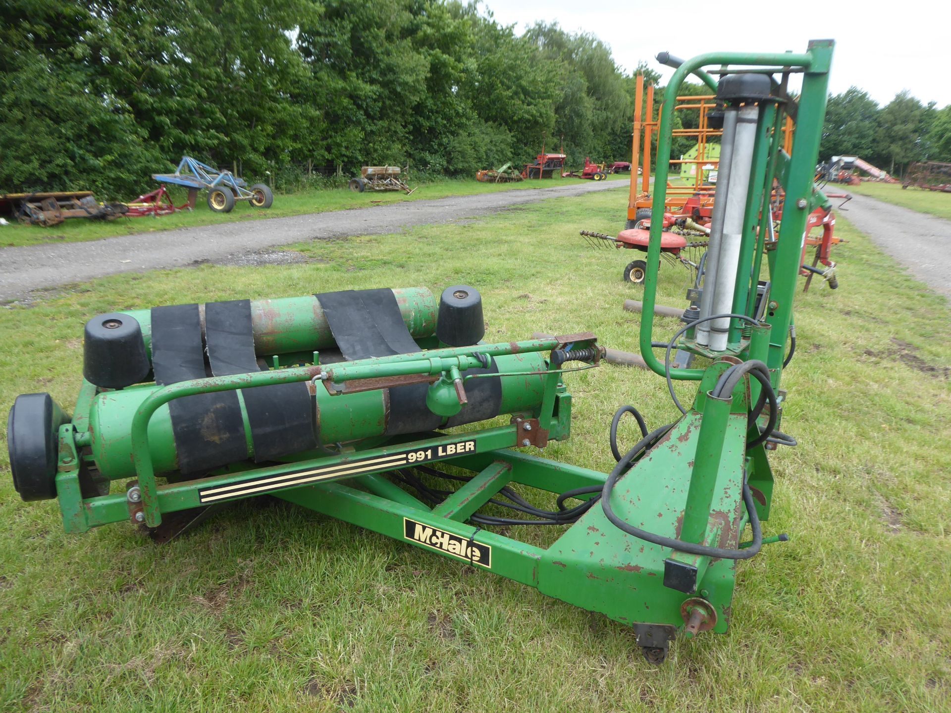 McHale 991 LBER round bale wrapper with remote and control box, 1998