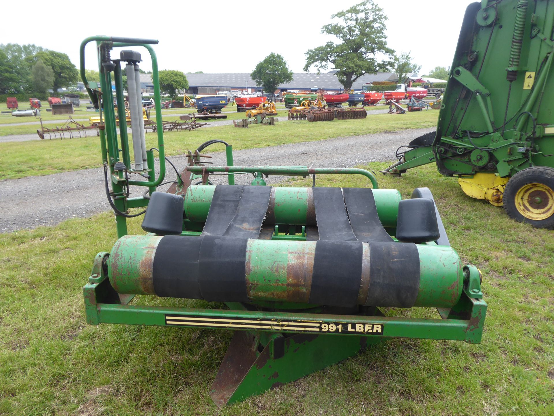 McHale 991 LBER round bale wrapper with remote and control box, 1998