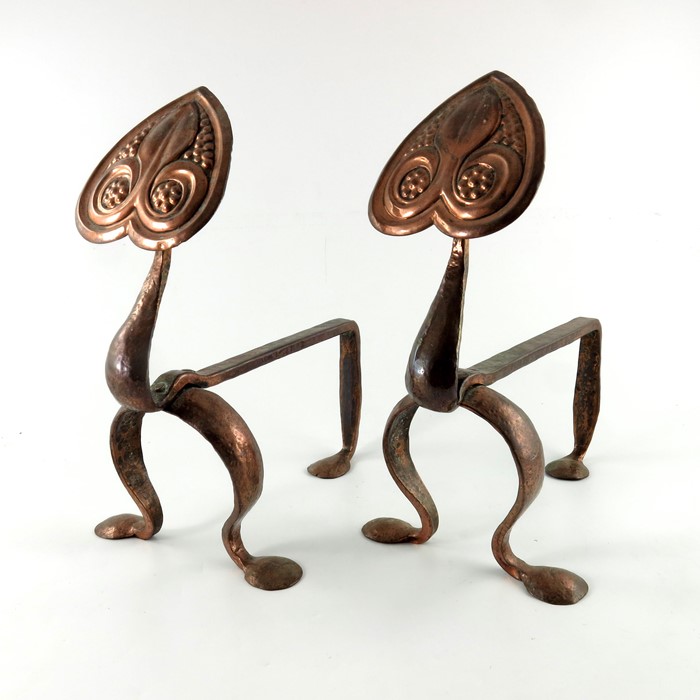 A pair of Arts and Crafts copper andirons, hand wrought, with repousse ...