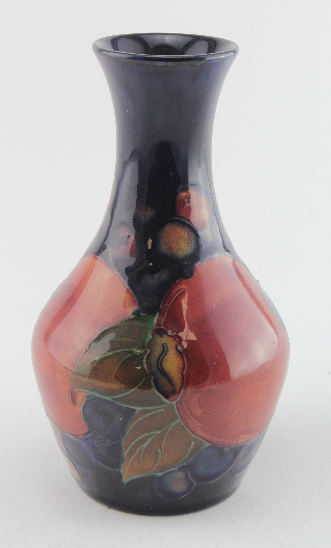 Moorcroft. Small Moorcroft vase, depicting pomegranate & berries, circa ...