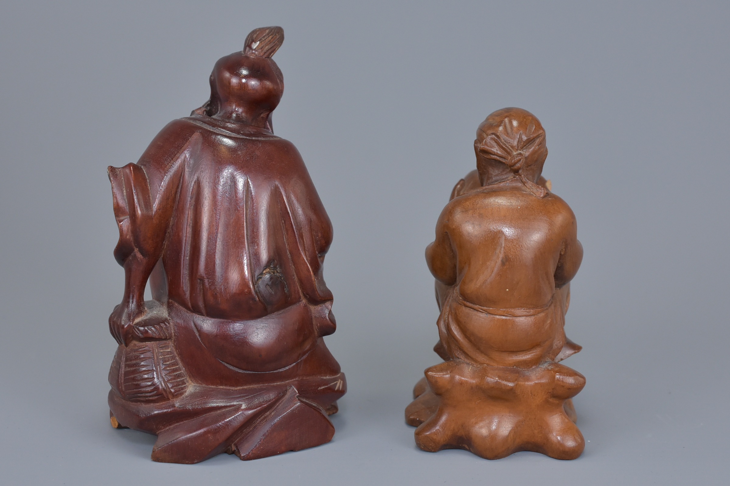 Four Chinese carved wooden figures, two in boxwood of Shaolou ...