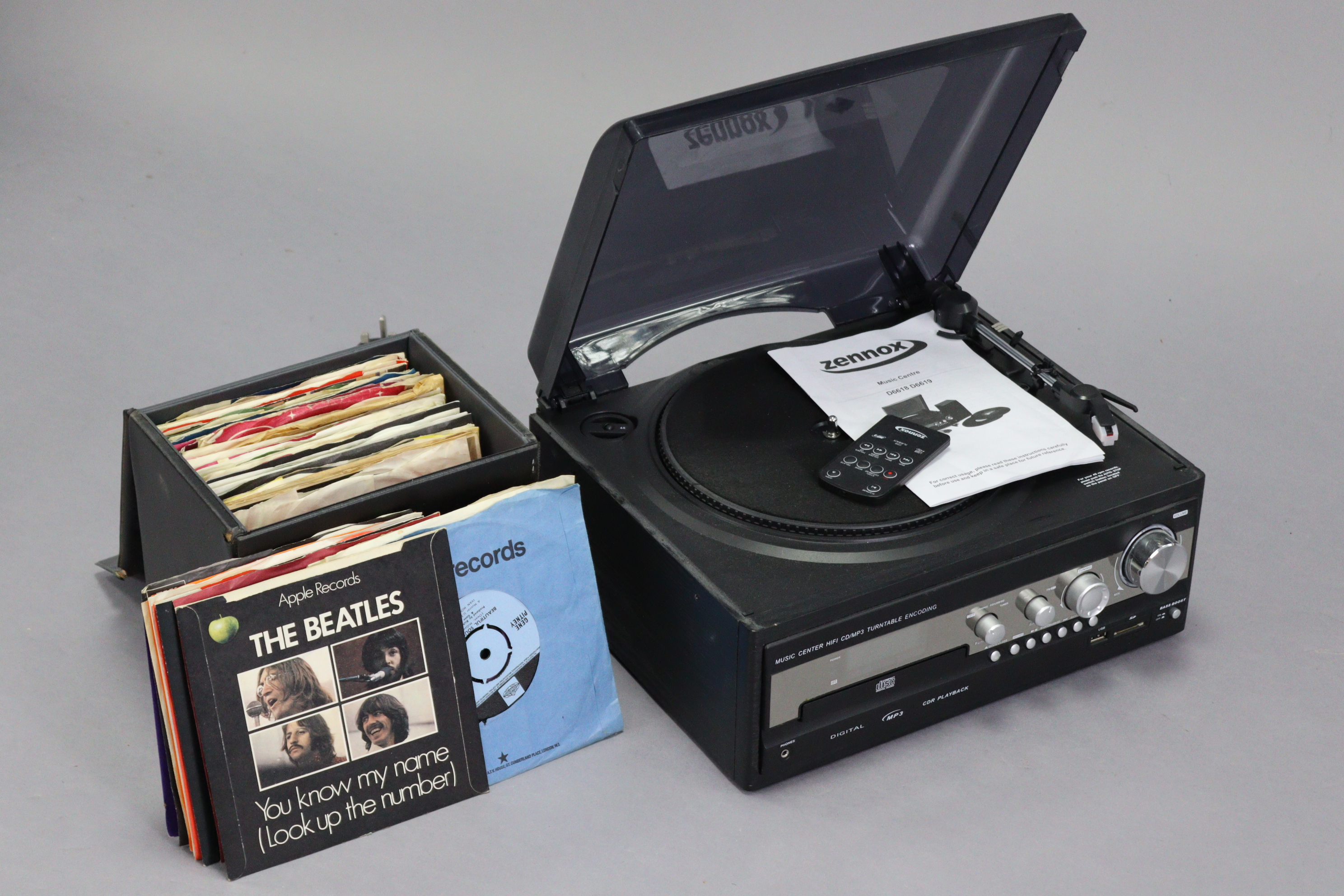 A “Zennox” CD/MP3 turntable, with remote control, w.o.; together with ...