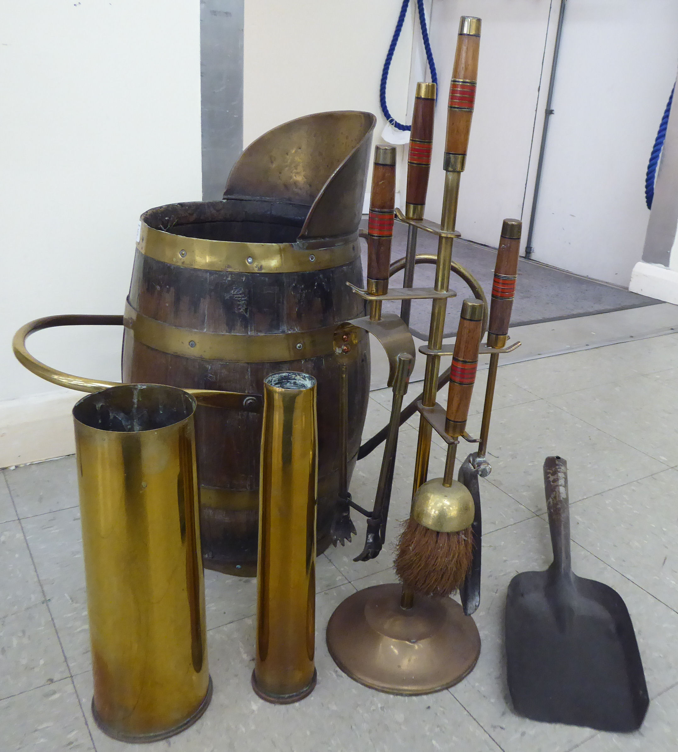 Early 20thC hearth related items: to include a coopered oak coal barrel ...