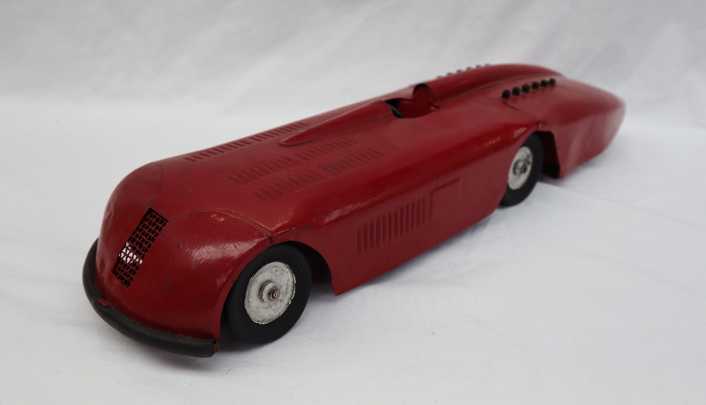 A Sunbeam 1000 land speed tin plate model car, with Dunlop Cord Racing ...