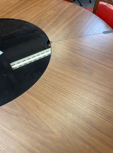 Giorgetti Fang; a contemporary dining table, the segmented circular ...