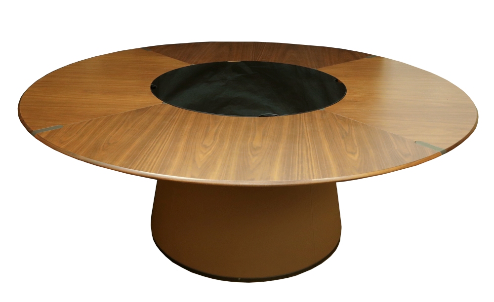 Giorgetti Fang; a contemporary dining table, the segmented circular ...