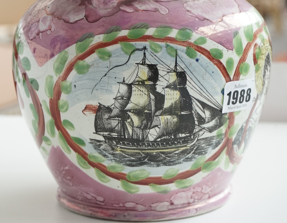 A Sunderland lustreware jug, early 19th century, pink lustre ground ...