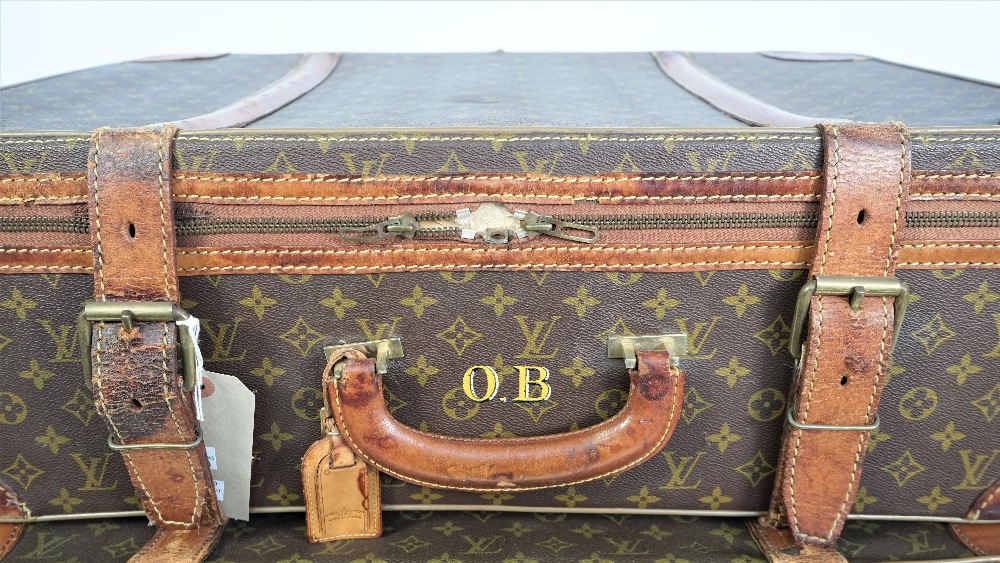 Two Louis Vuitton suitcases, circa 1980, each with monogrammed canvas ...