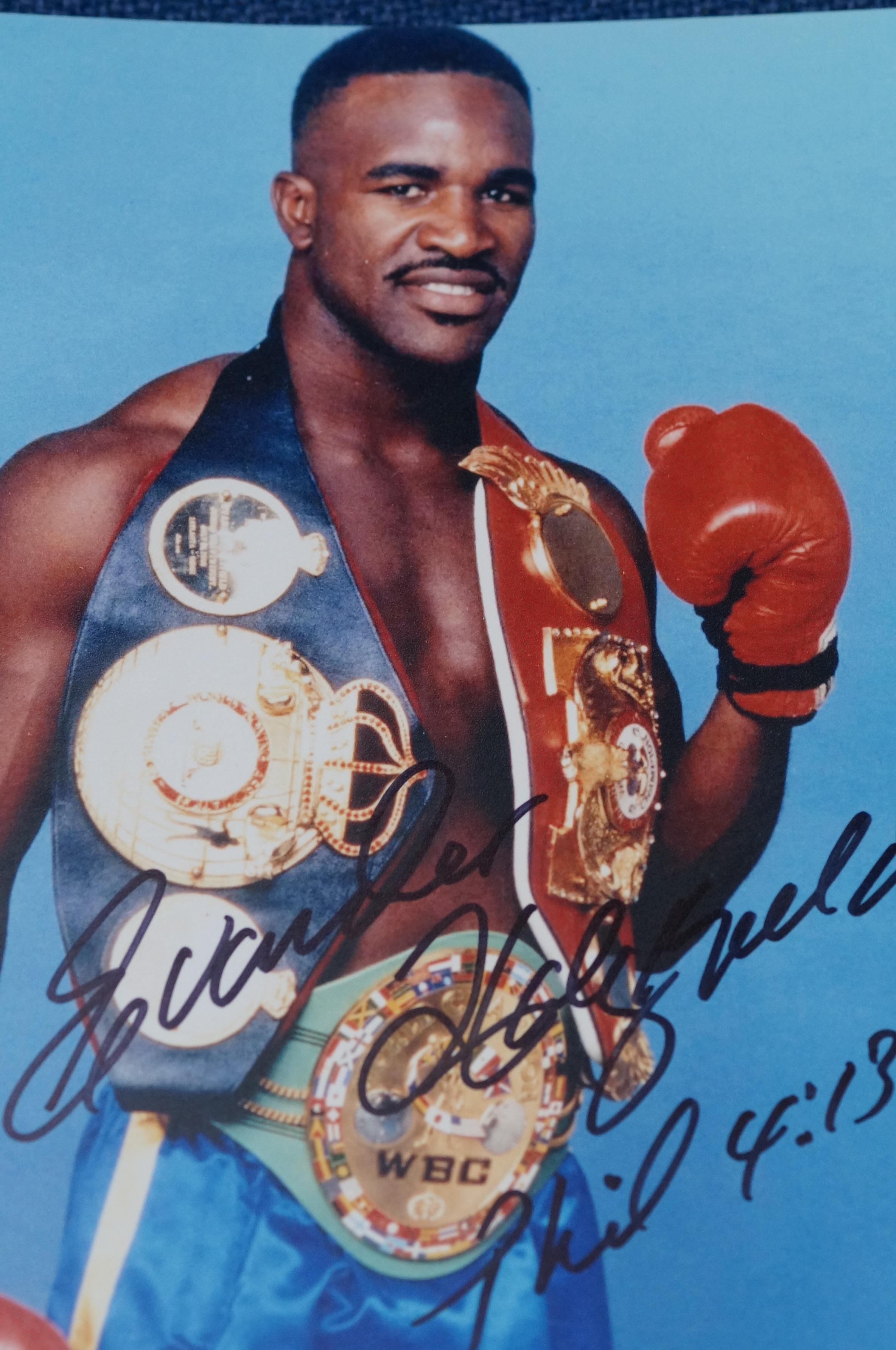 Evander Holyfield autograph, signed on a 10" x 8" picture. Signed ...
