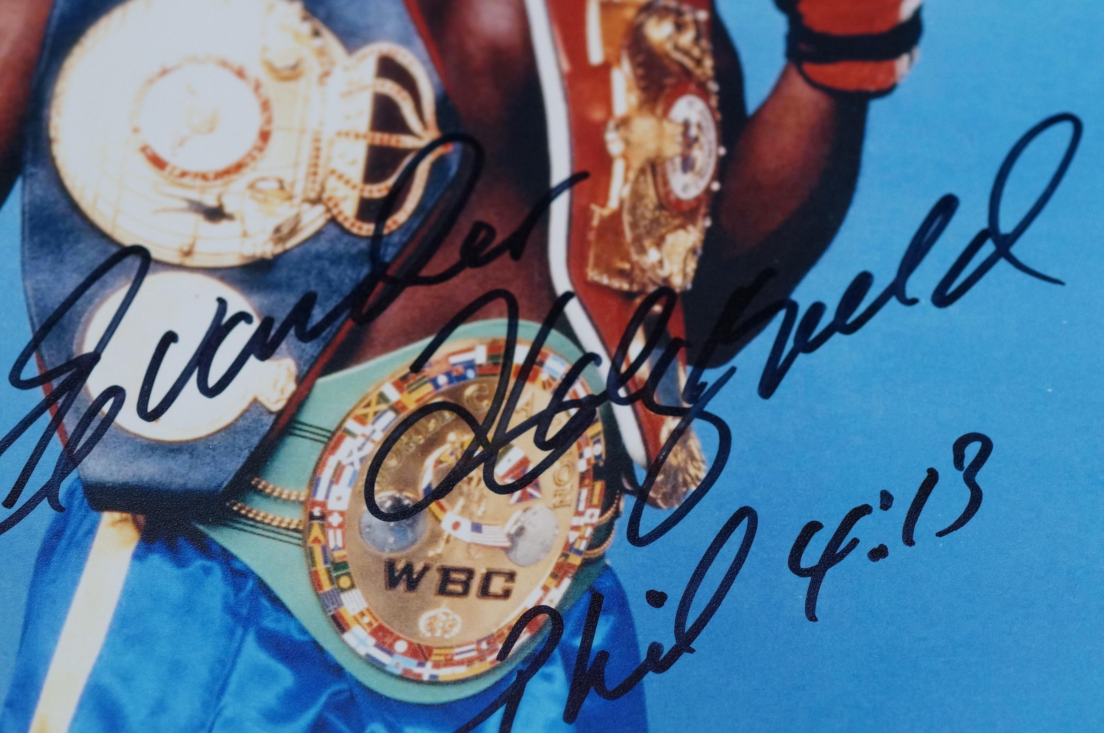Evander Holyfield autograph, signed on a 10" x 8" picture. Signed ...
