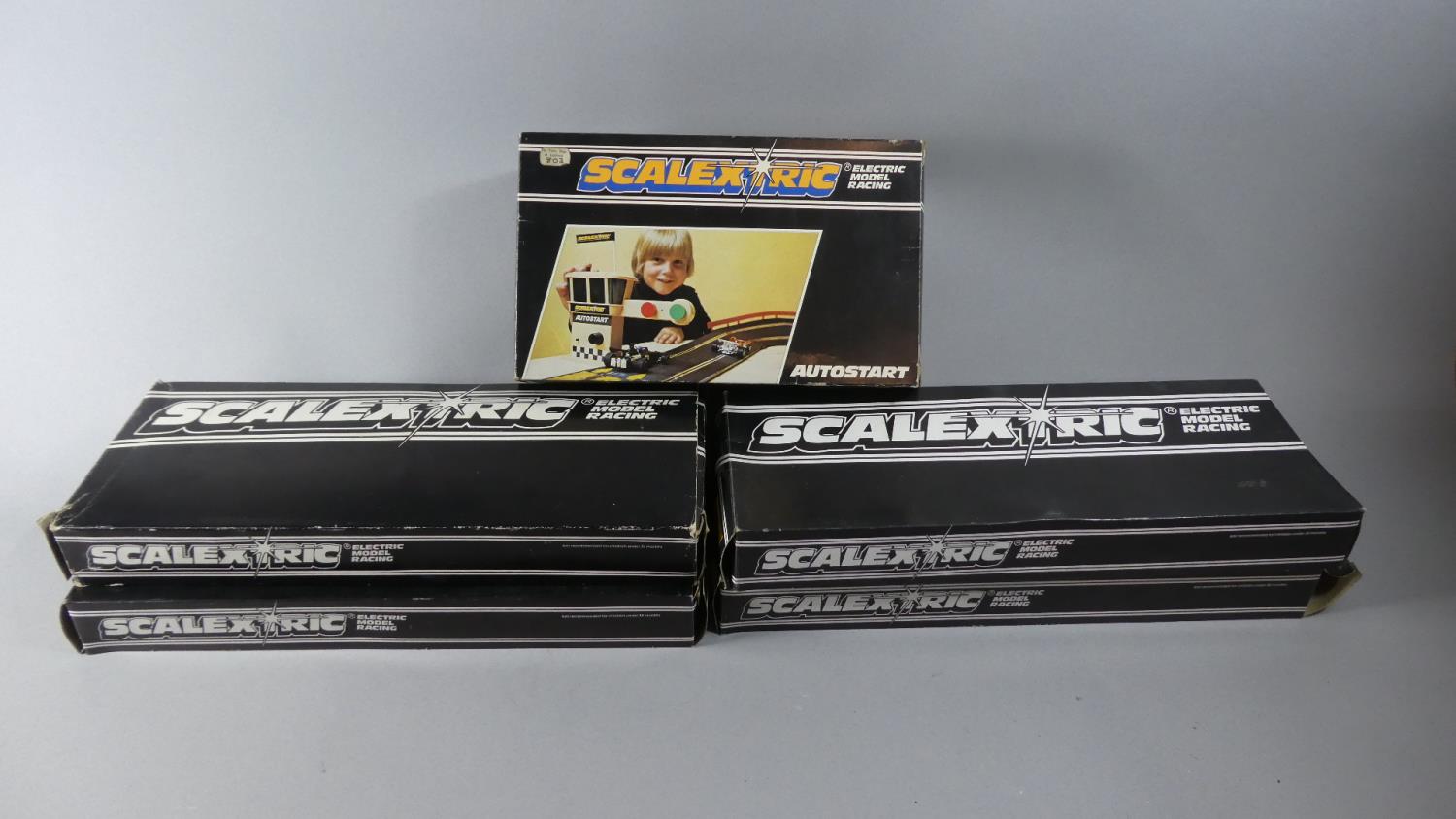 A Collection of Five Boxed Vintage Scalextric Accessories comprising C ...