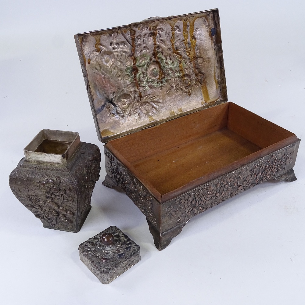 A Chinese antimony box with relief moulded chrysanthemum designs ...