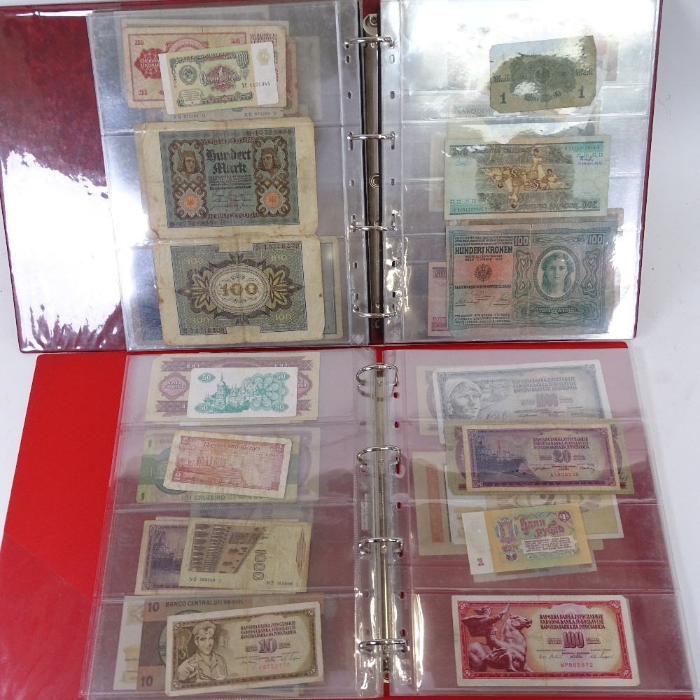 2 albums of world banknotes