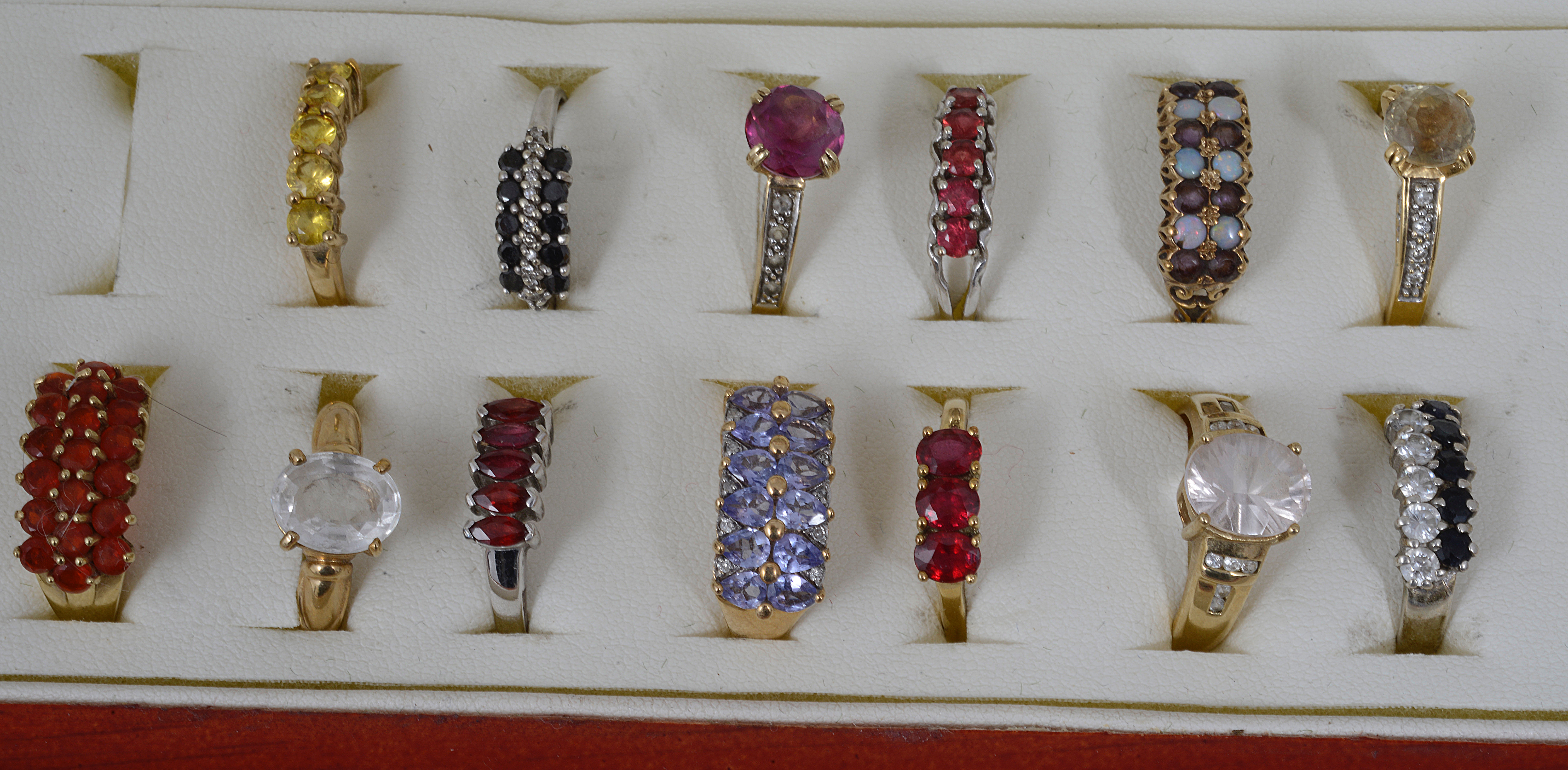 A large collection of contemporary gold mounted gem set ...