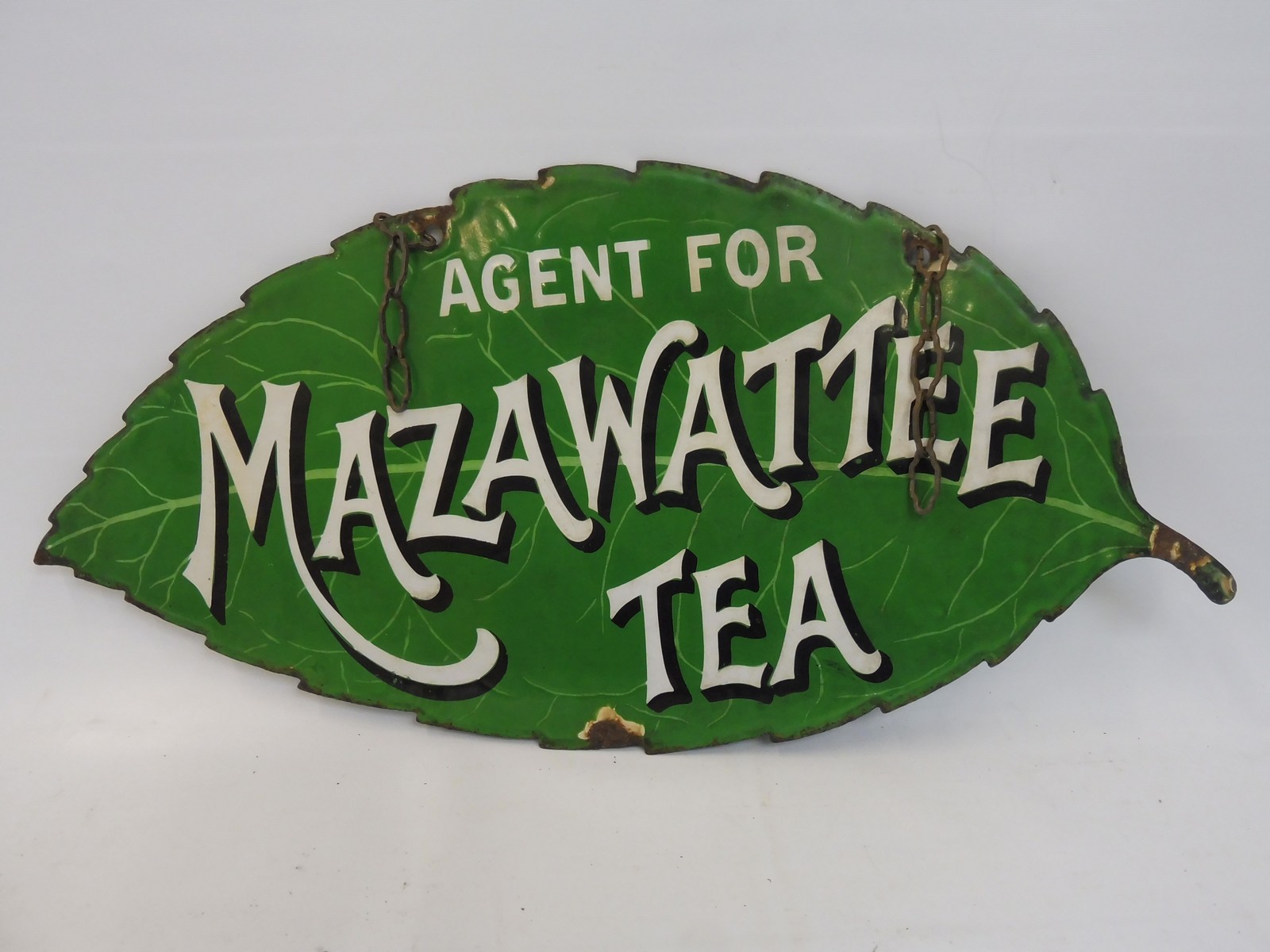 A rare Mazawattee Tea double sided leaf-shaped agency sign, in good ...