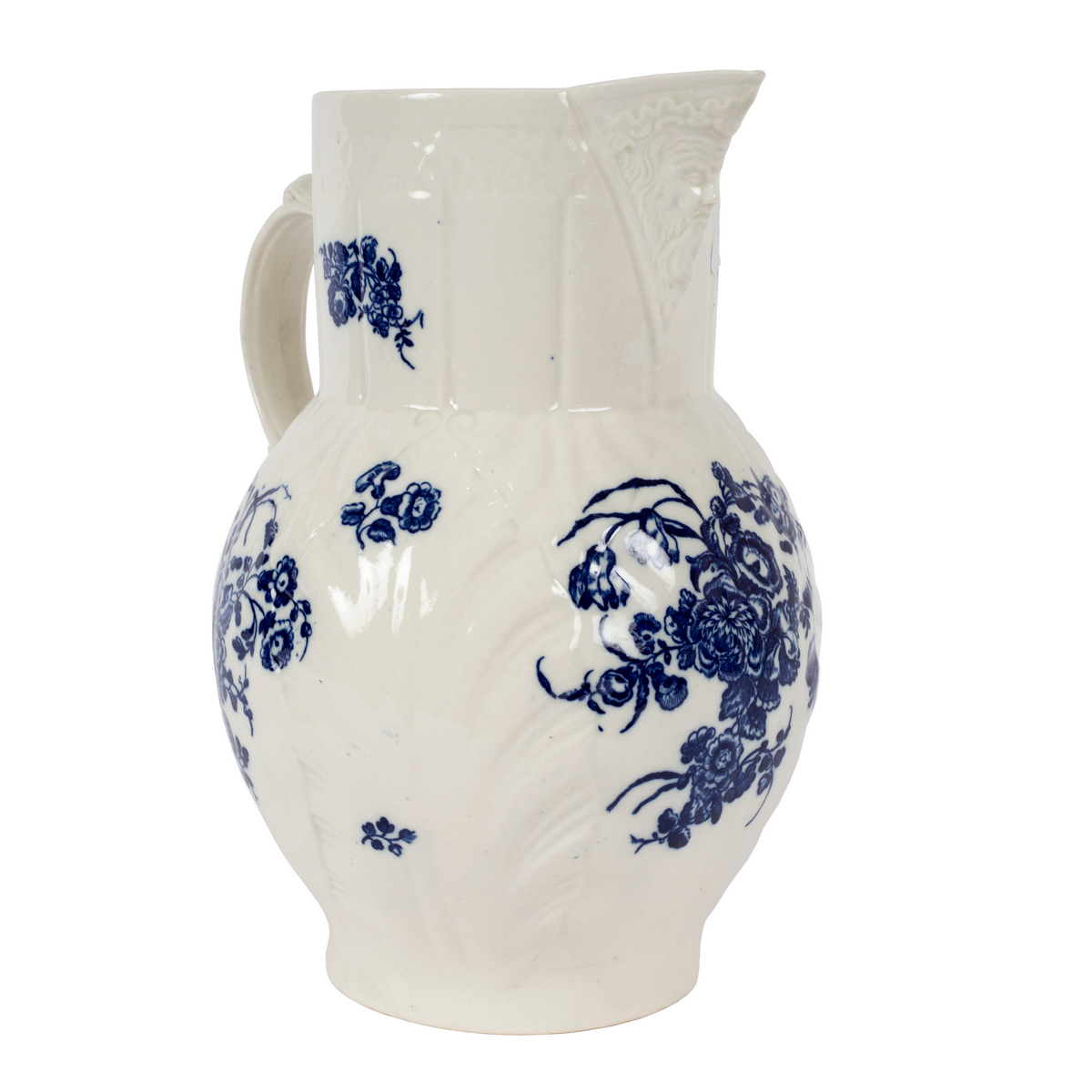 A Caughley cabbage-leaf moulded mask jug, circa 1780, printed in blue ...