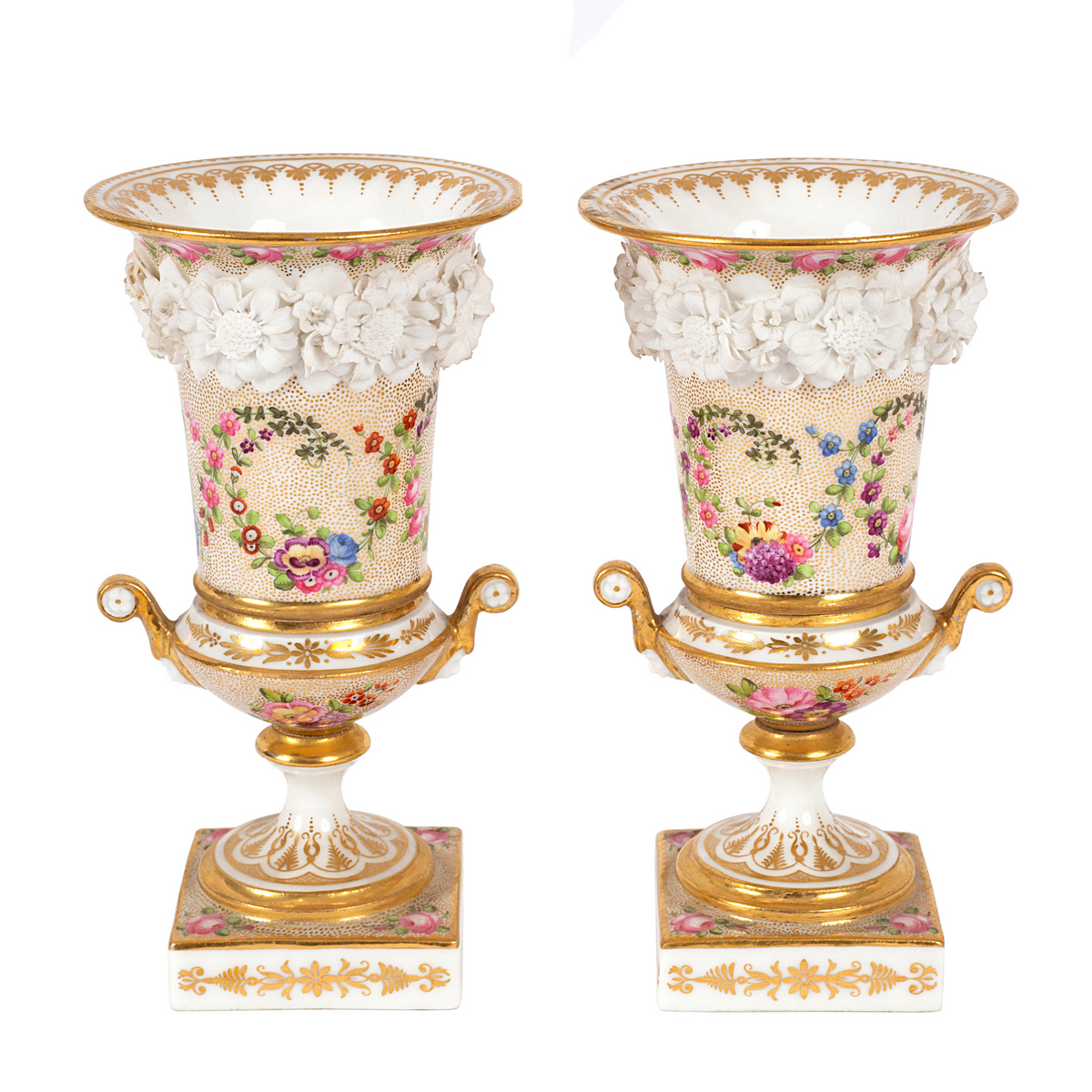 A pair of Swansea spill vases, circa 1820, of Classical urn shape ...