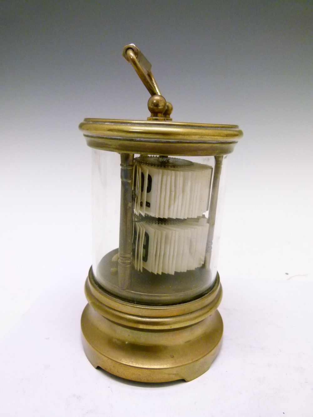 Early to mid 20th Century brass-cased Plato or ticket clock, having two ...