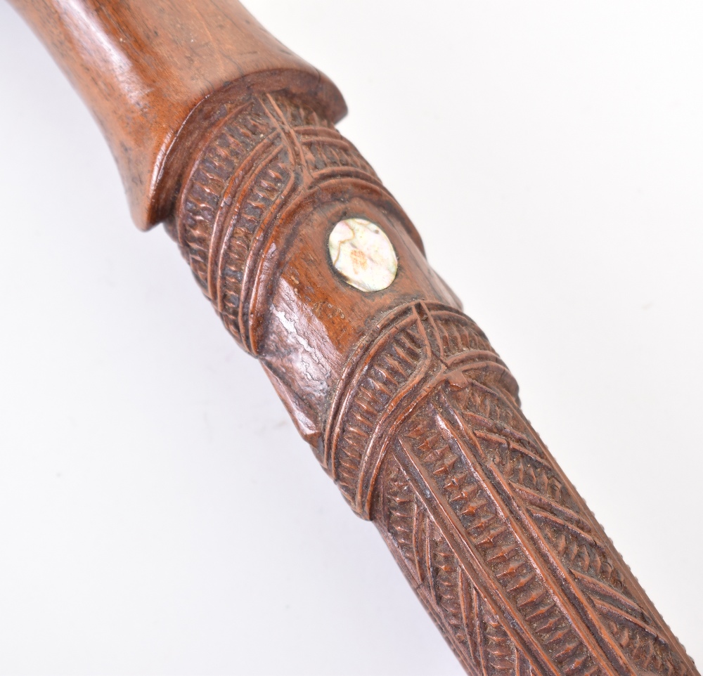 Maori carved wooden walking stick, late 19th century, 34.5” carved with ...
