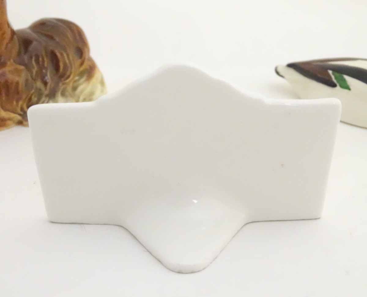 Two Beswick animals, a begging Pekinese dog, model no. 1059, impressed ...