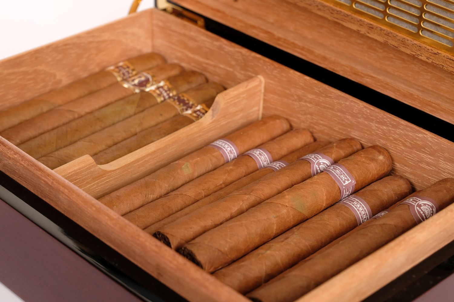 * Cigars. A fine collection of 143 Cuban cigars housed in 3 humidors ...