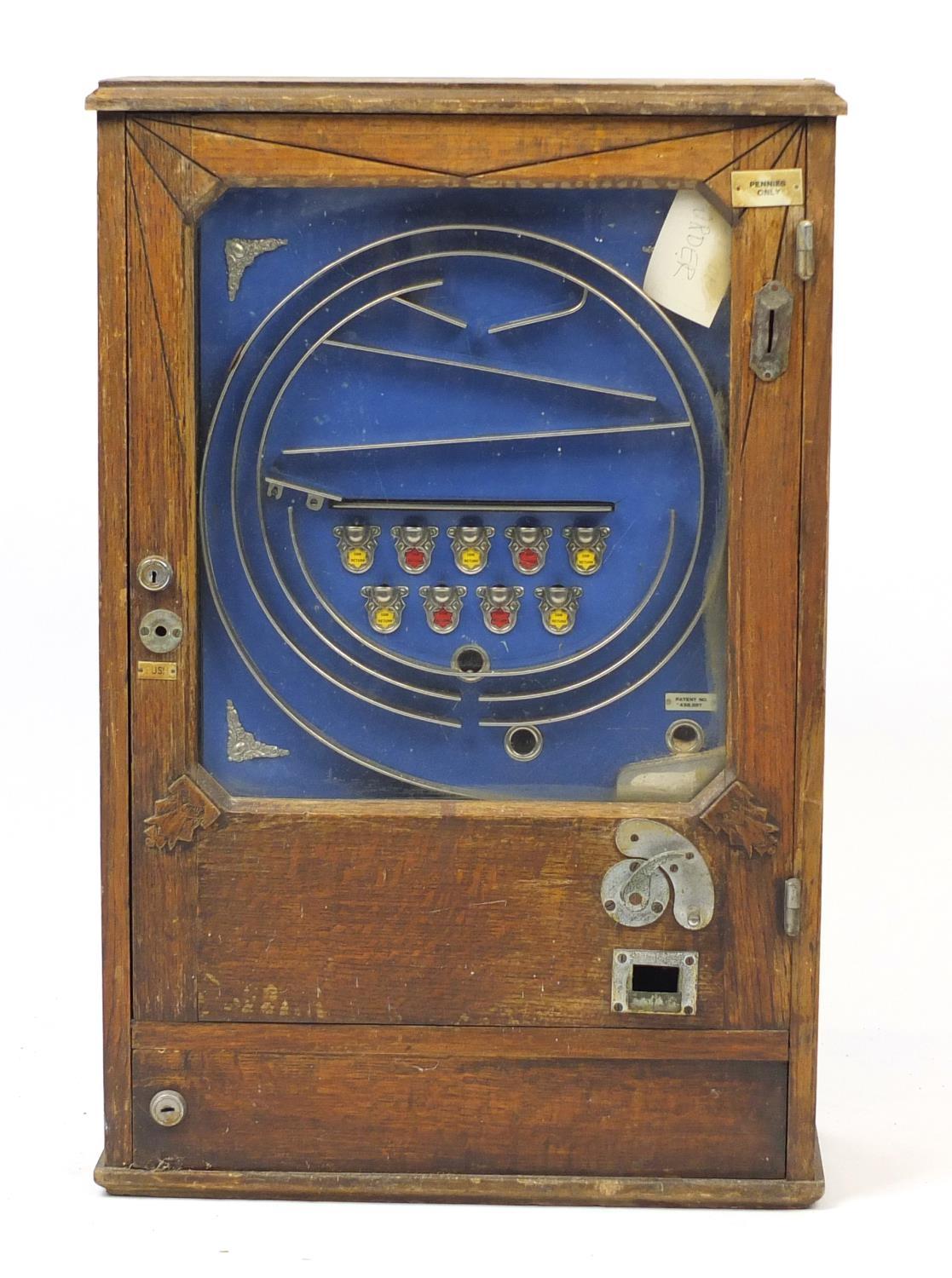 1920's oak cased penny pinball slot machine, 83cm H x 55.4cm W x 21.5cm ...