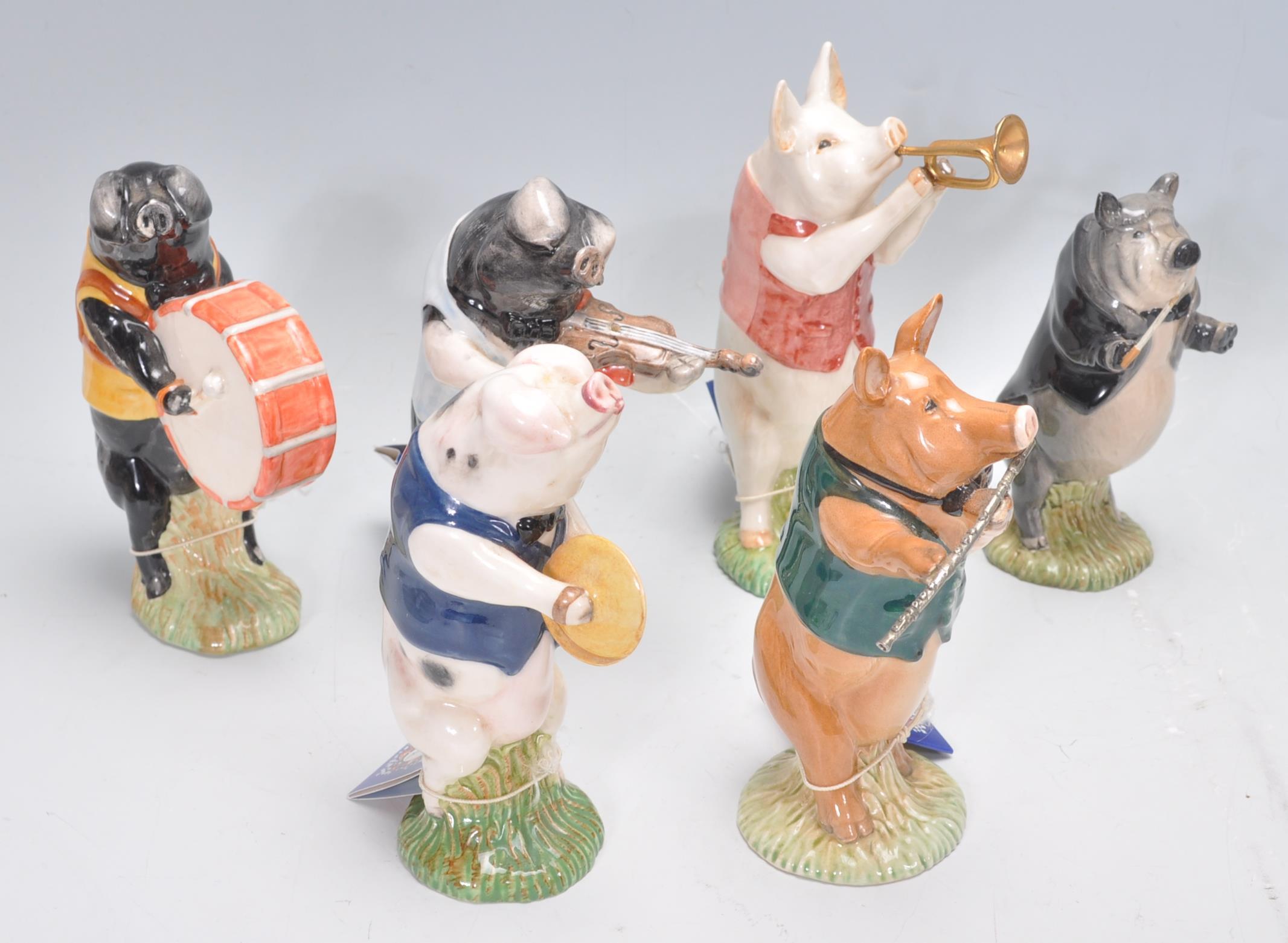 A collection of Beswick Orchestra collection ceramic figurines to ...