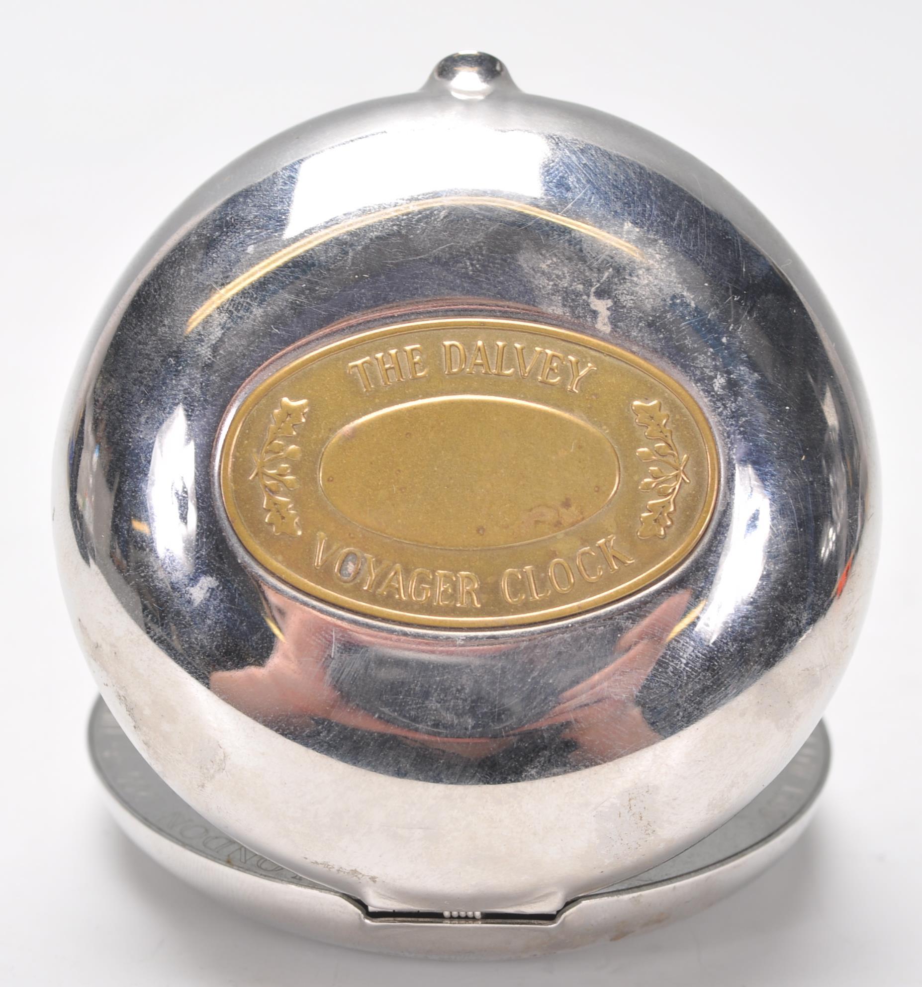 A vintage Grants of Dalvey Voyager clock modelled as a compass, in its ...