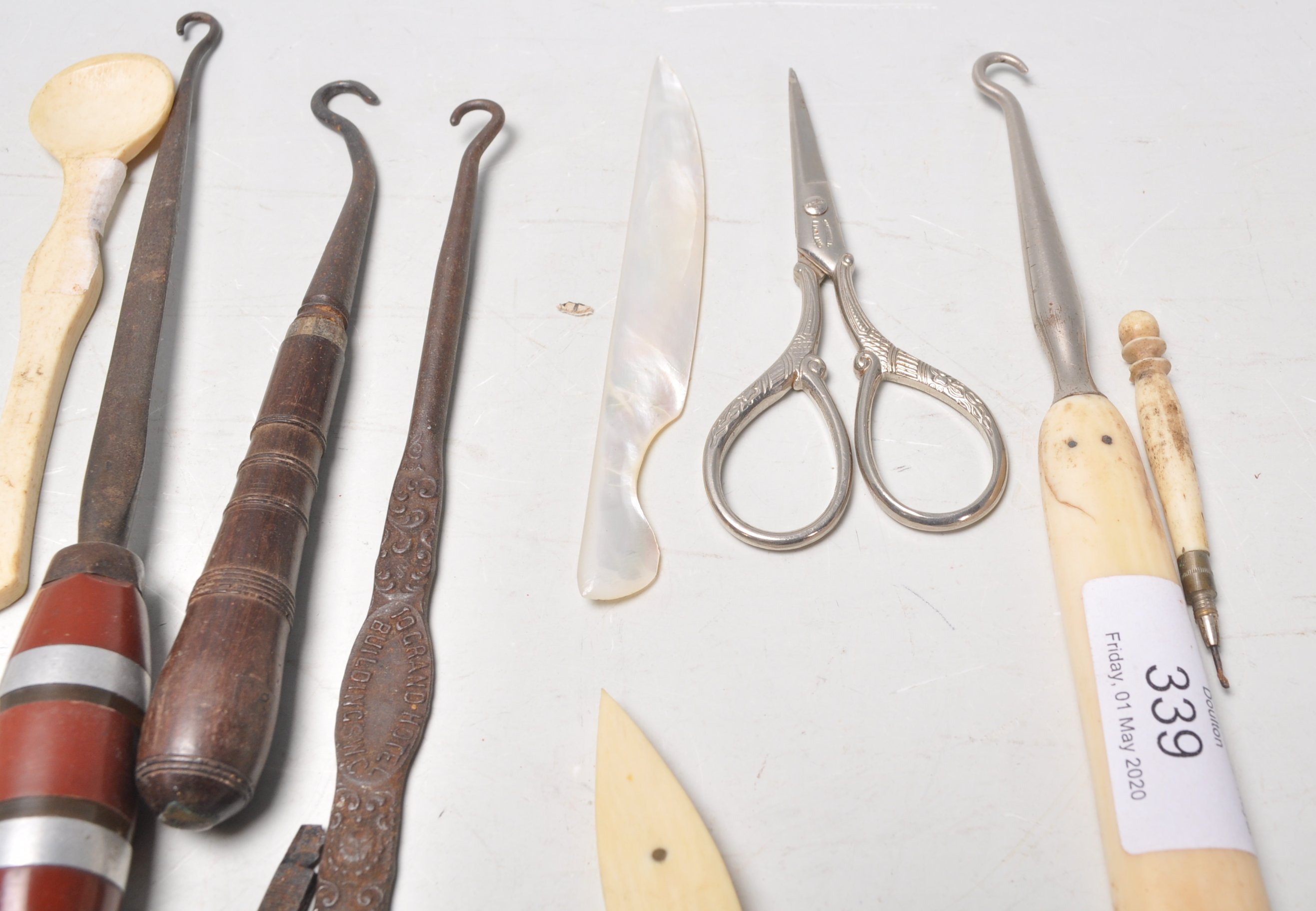 A collection of vintage and antique sewing related items to include ...
