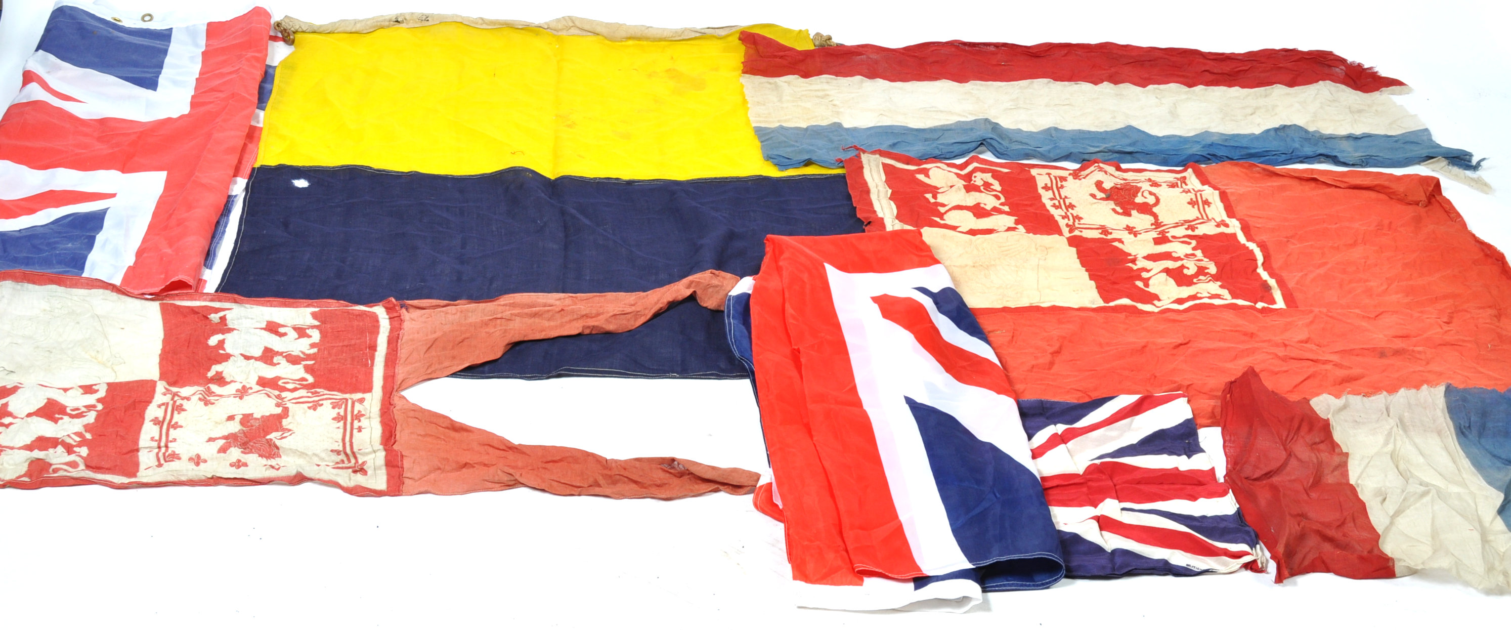 A collection of assorted vintage WWII Second World War and later flags ...