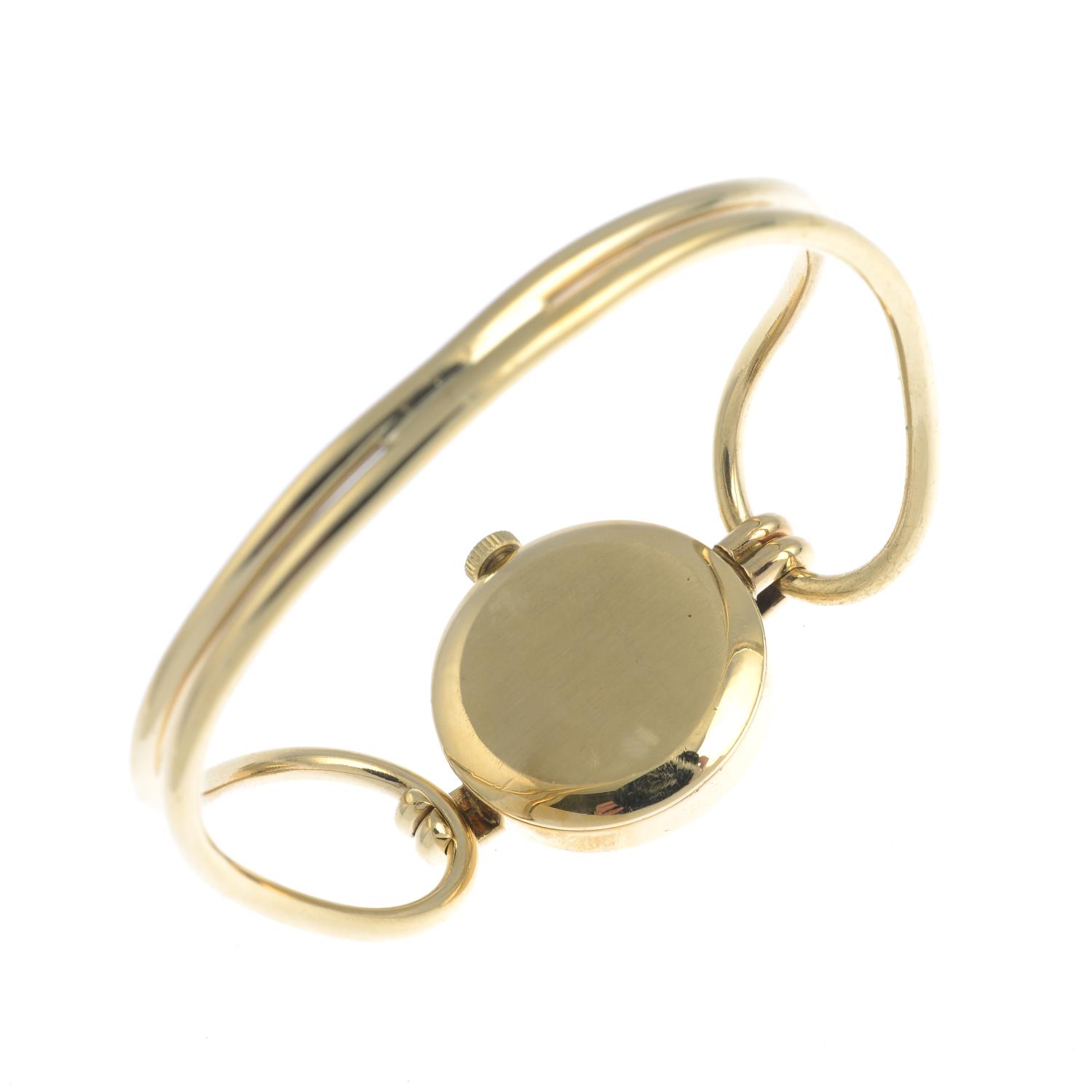 A bangle watch, by Roy King.Dial signed Roy King.Stamped 375.Inner ...