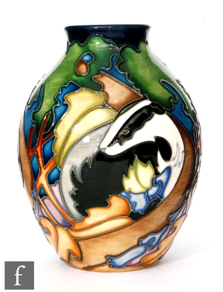 A Moorcroft Pottery vase decorated in The Sett pattern designed by ...