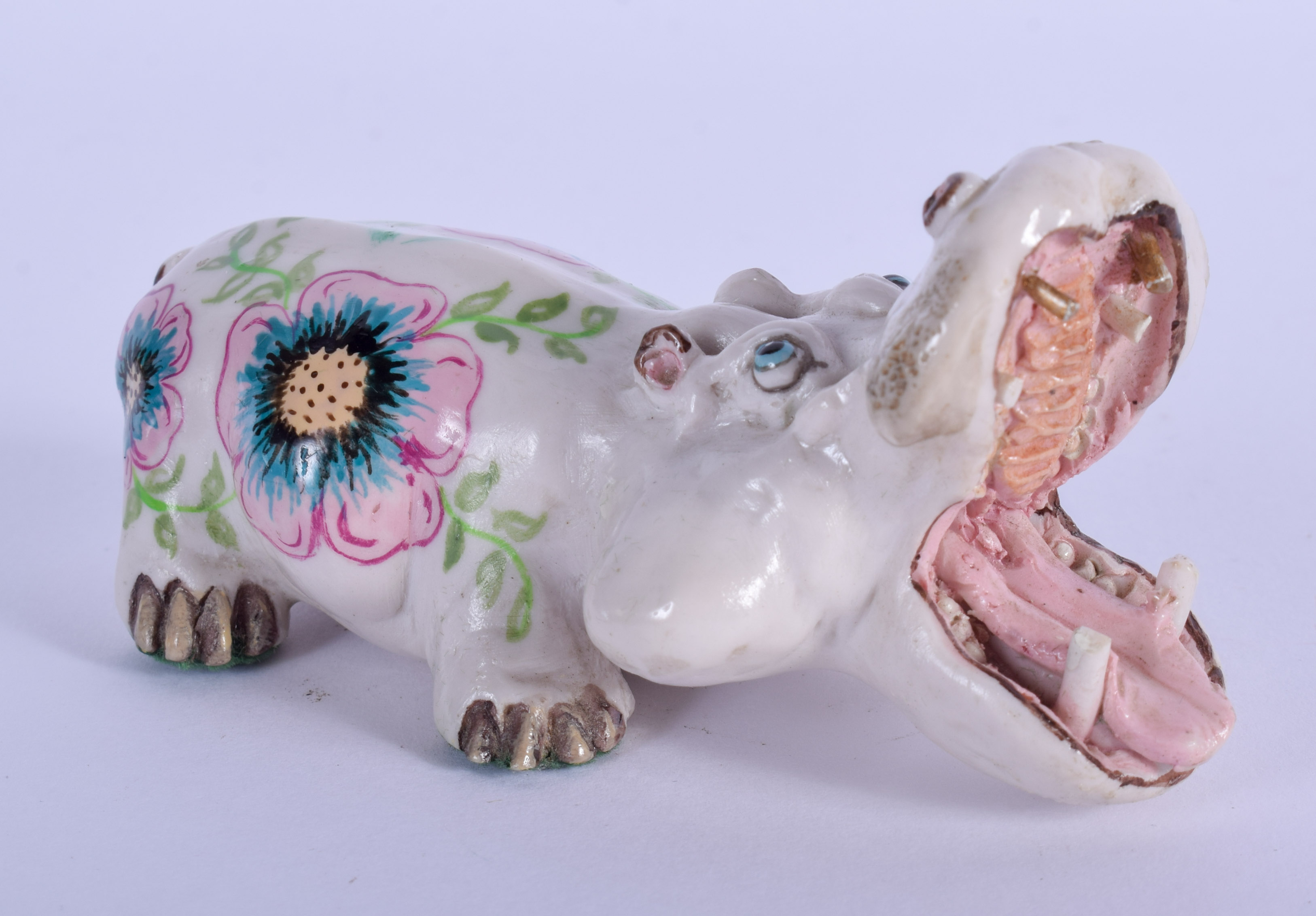 A BASIL MATTHEWS POTTERY HIPPO. 9 cm wide.
