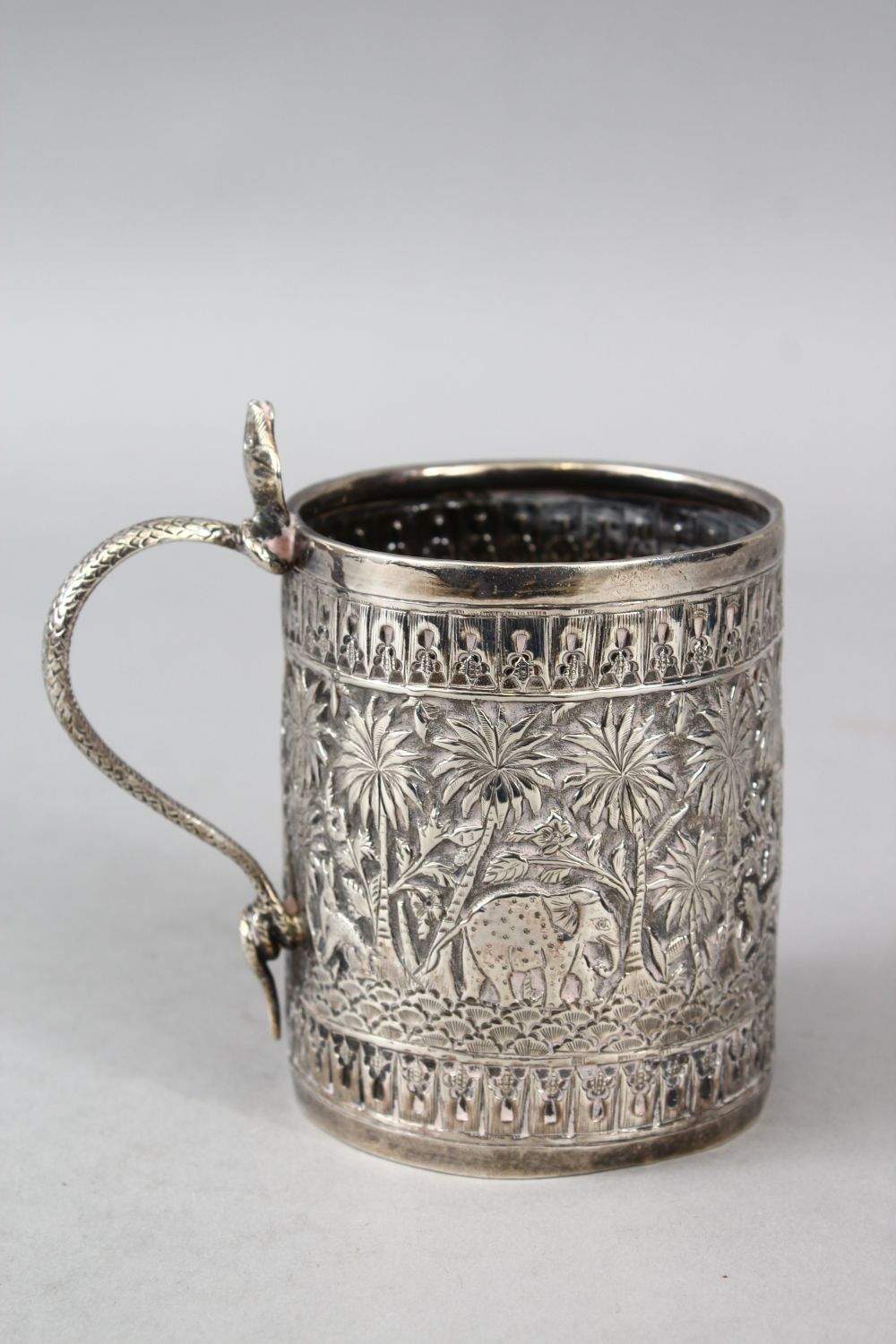 A 19TH CENTURY INDIAN KASHMIR SILVER BEAKER / CUP, with embossed ...