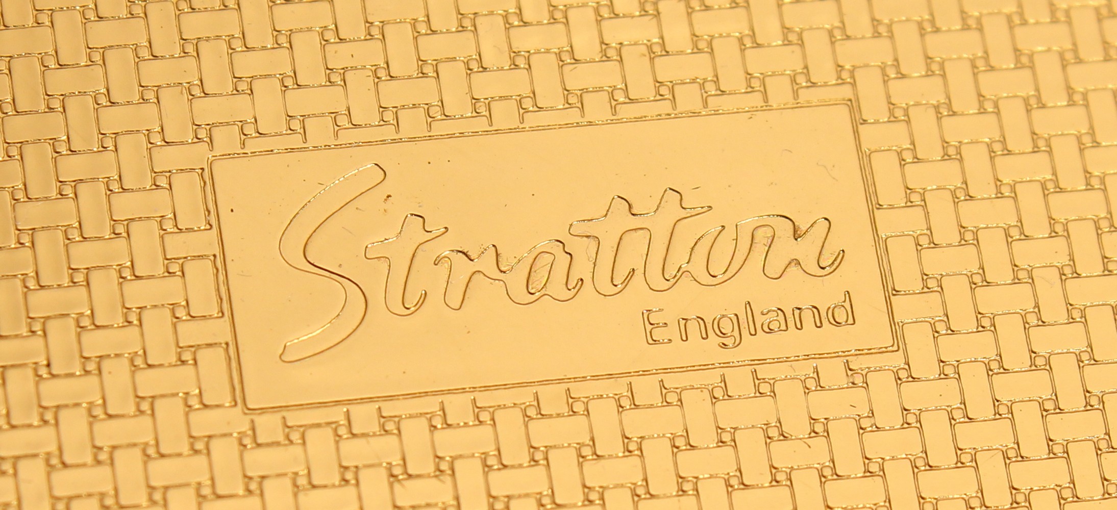 A LADIES STRATTON COMPACT in original box.