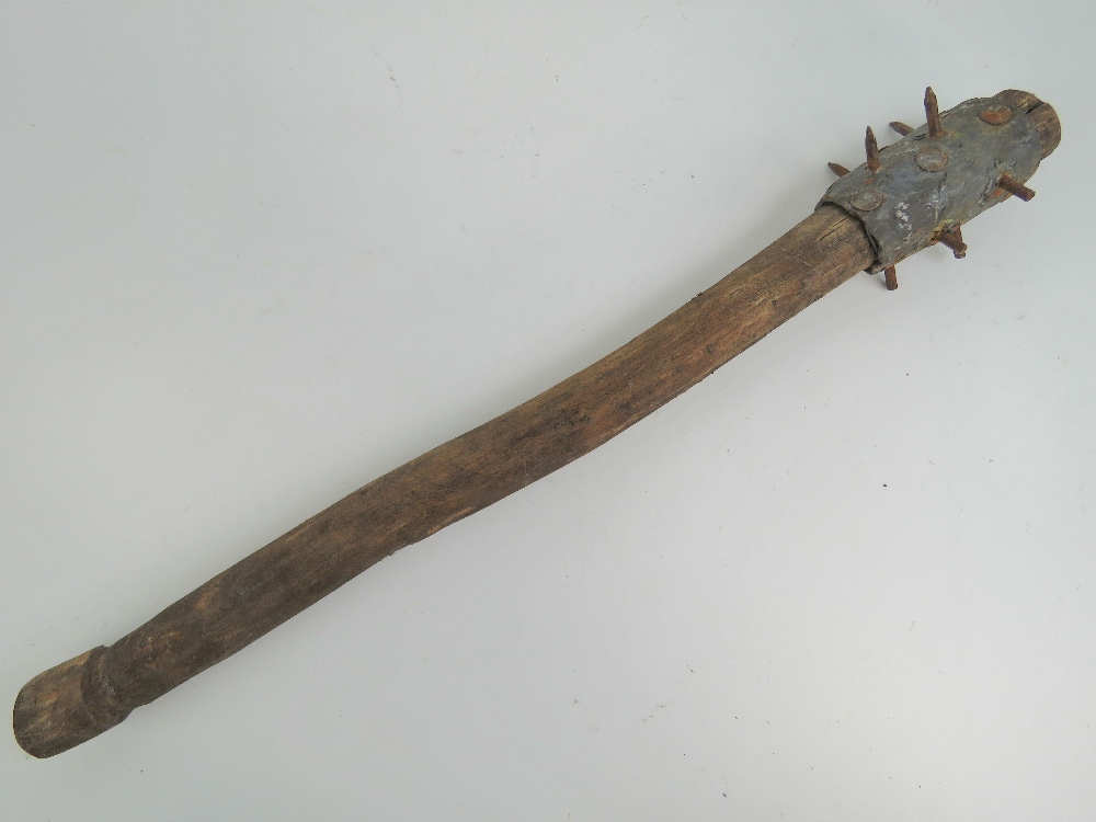 A WWI German trench club, 43cm in length.