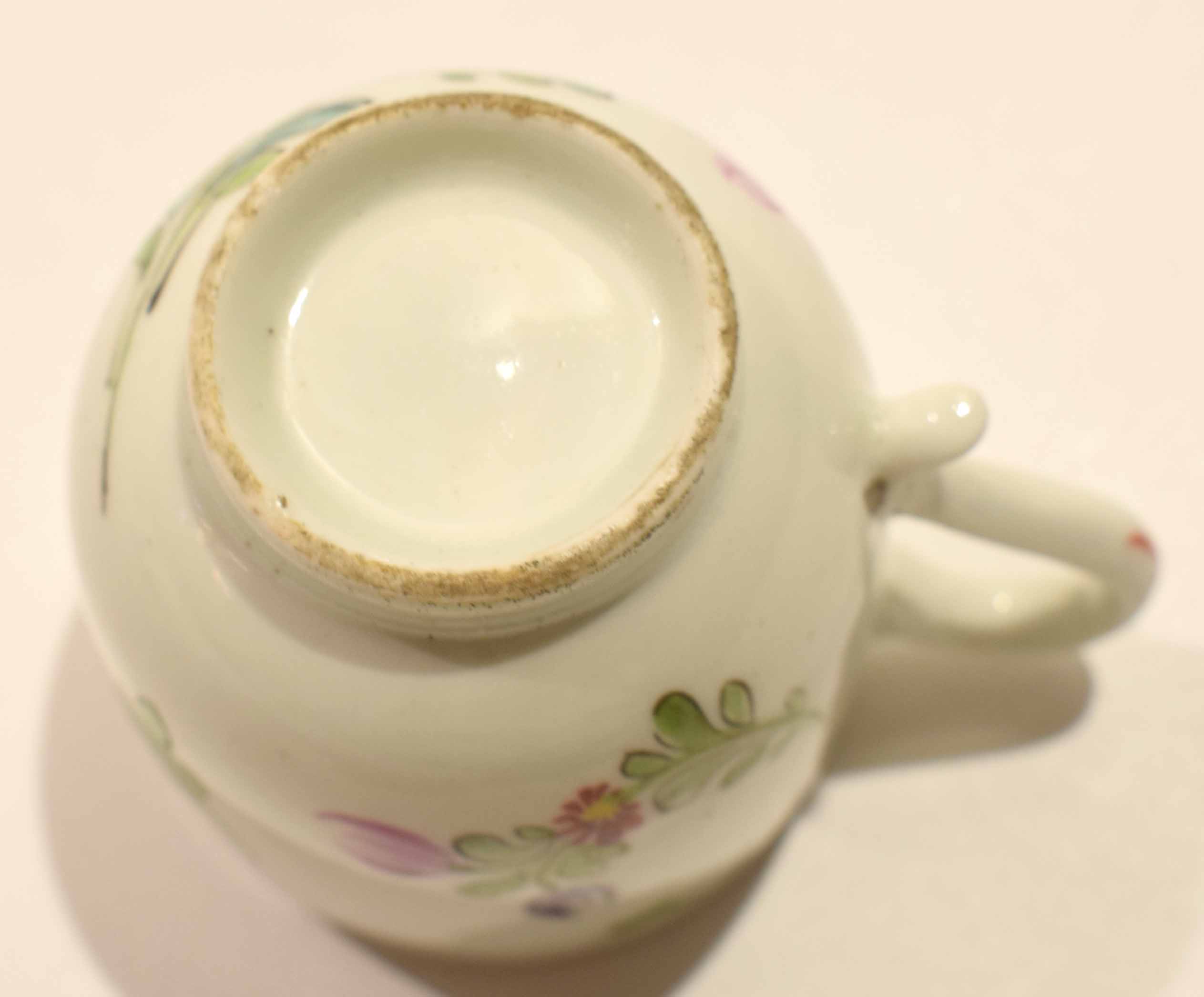 18th century Lowestoft porcelain tea cup decorated with the so-called ...