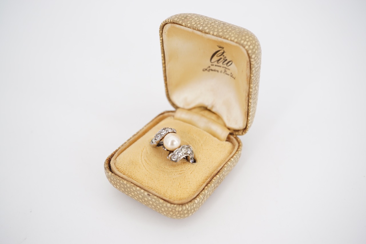 A vintage white-metal Ciro faux pearl and paste set cocktail ring, in ...
