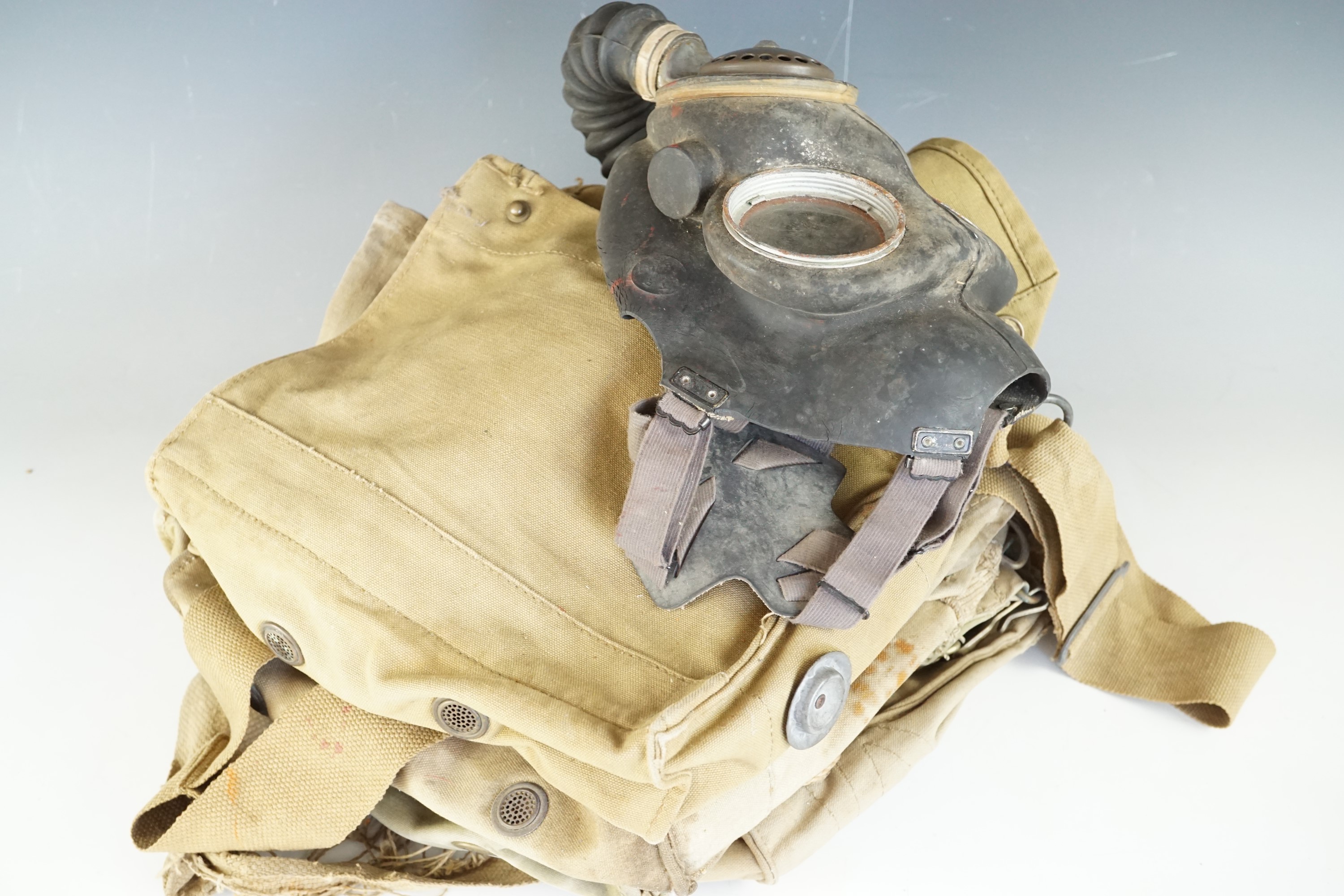 A Second World War British army gas mask and several General Service ...