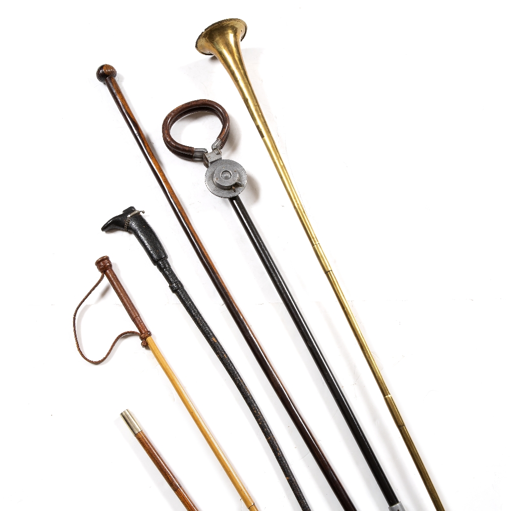 A LIGNUM VITAE STAFF with knob handle 155cm high, a novelty riding whip ...