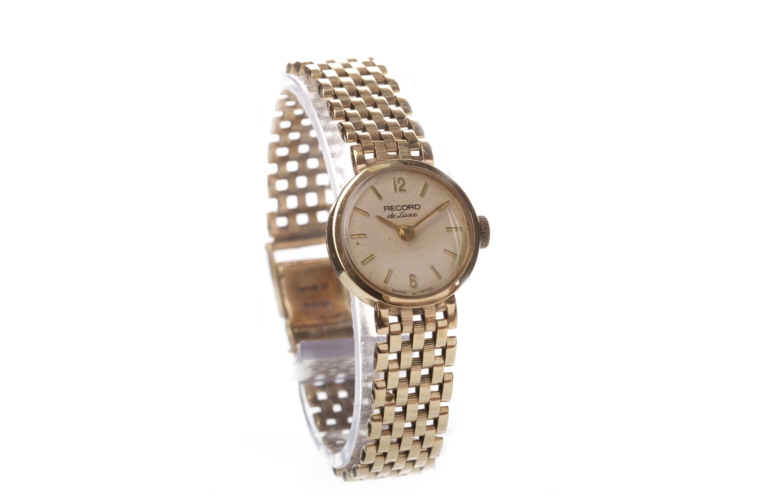 LADY'S RECORD DE LUXE NINE CARAT GOLD MANUAL WIND WRIST WATCH, signed ...
