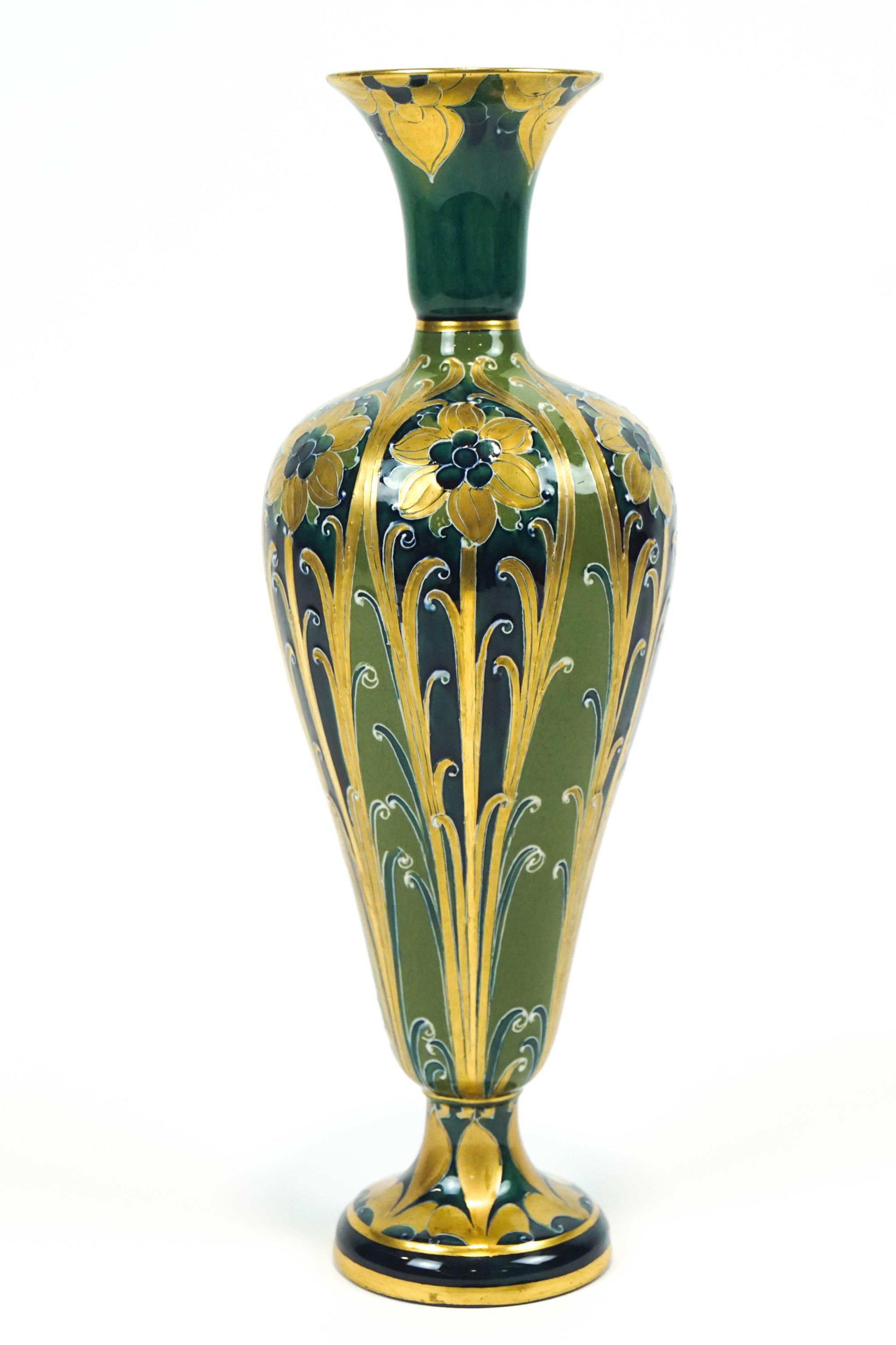 William Moorcroft for Macintyre, a green and gold 'Florian ware ...