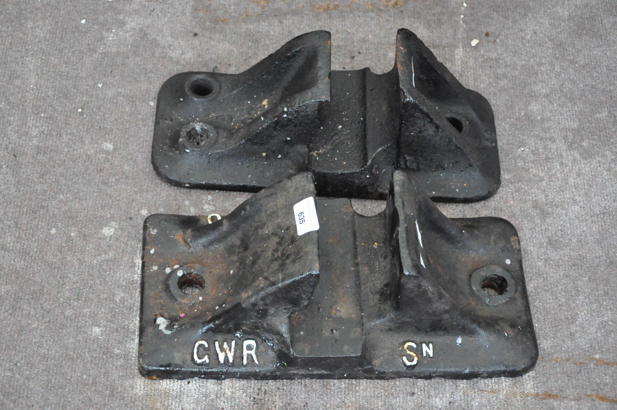 Two early railway track shoes, one marked 'Great Western Railway 1920'