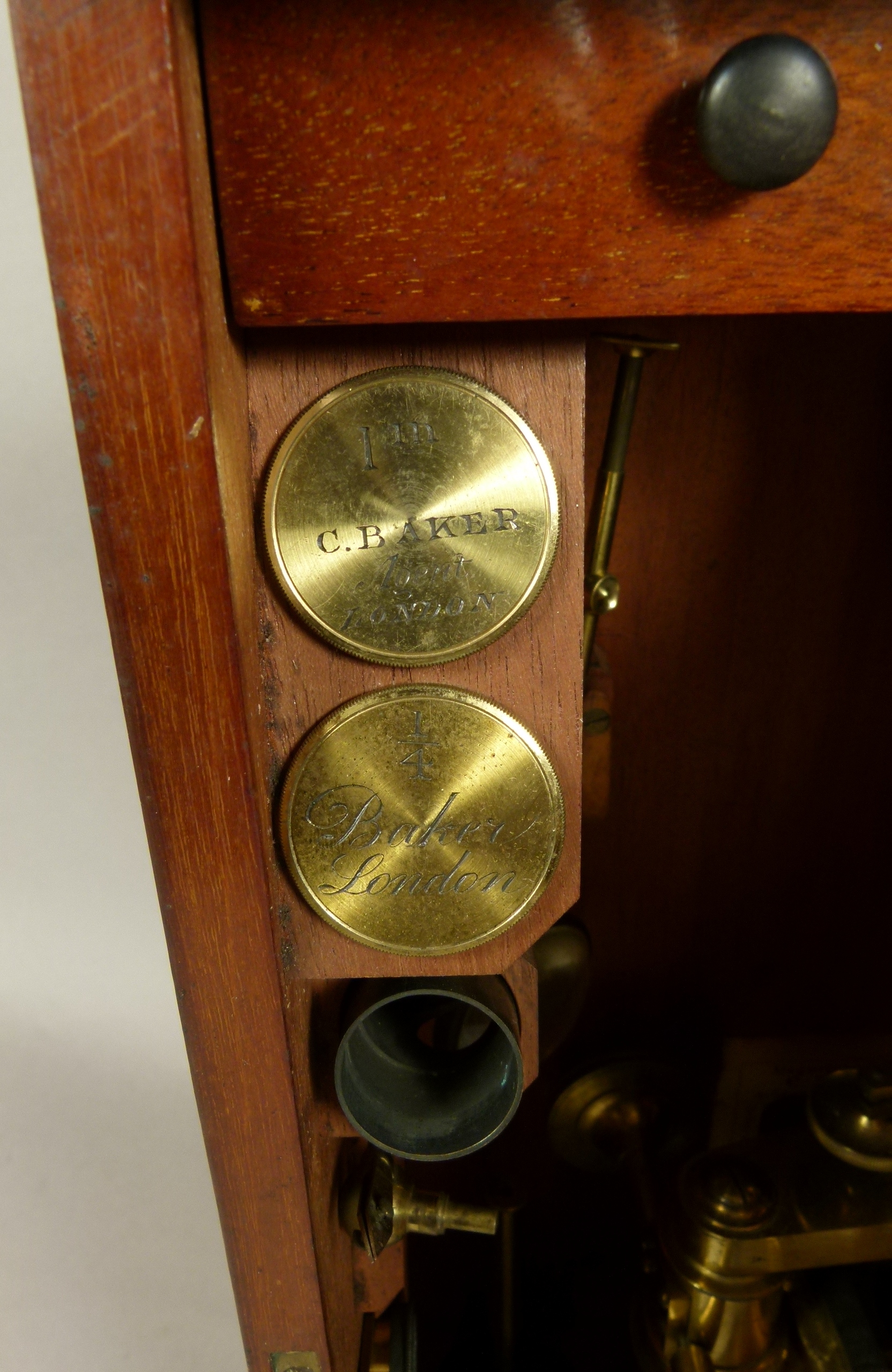 A 19TH CENTURY BRASS MICROSCOPE BY C. BAKER OF LONDON, complete with ...