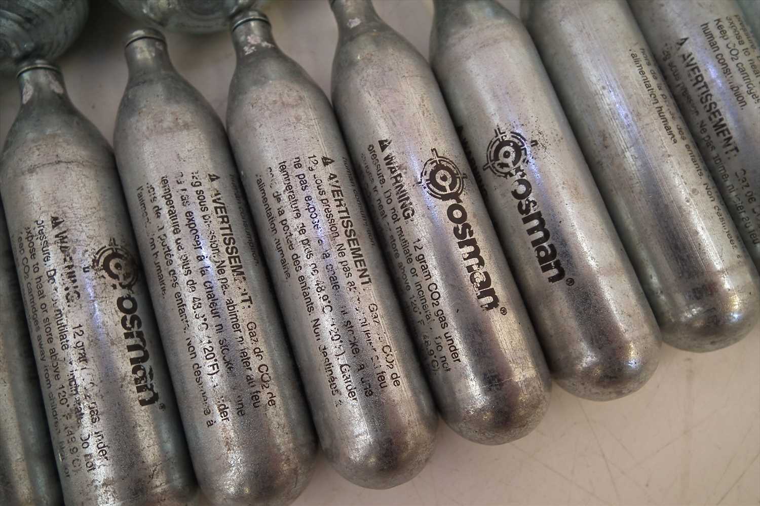 Collection of Co2 canisters, to include fourteen 90g screw fit ...